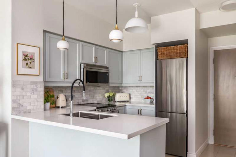 Before and after: A once-dated kitchen gets a calm, modern refresh
