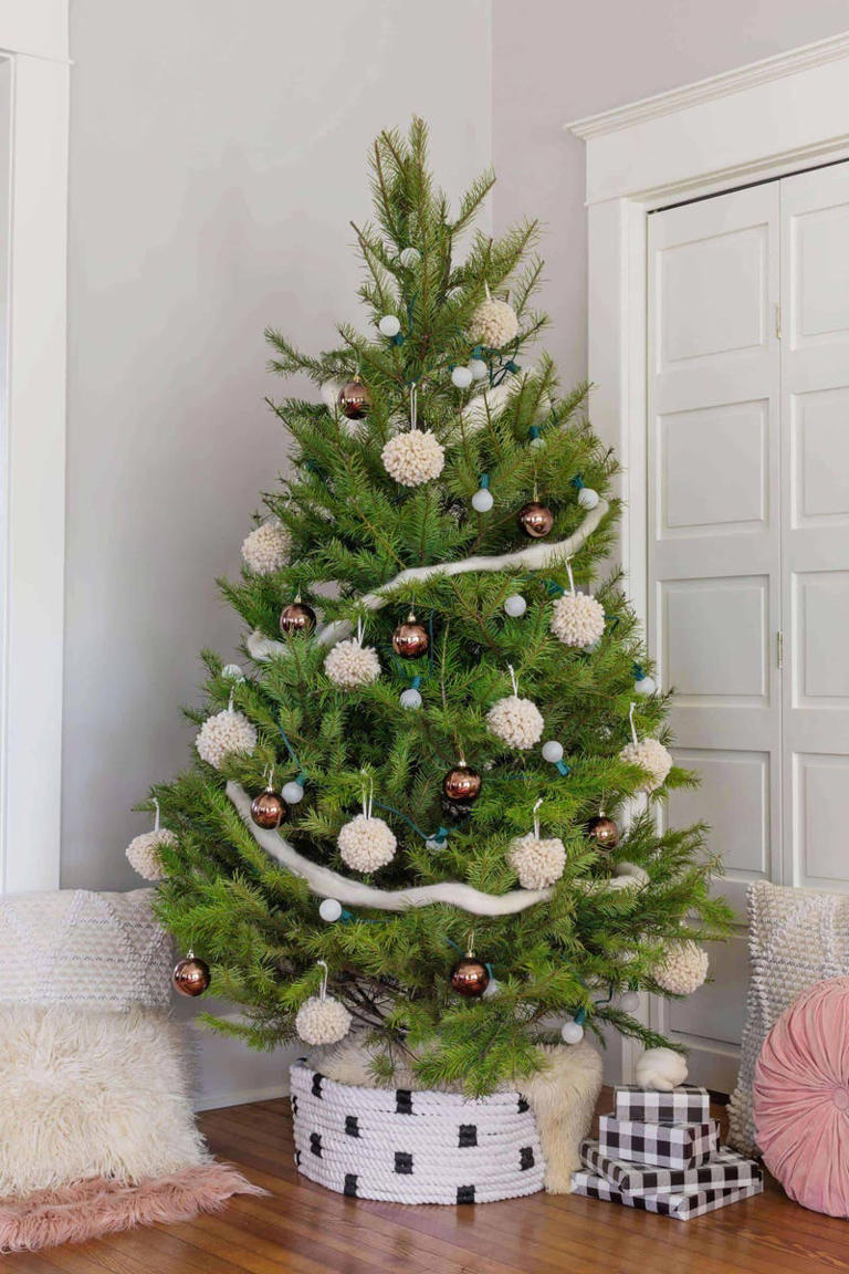 These DIY Christmas tree stand ideas will create such a festive setup