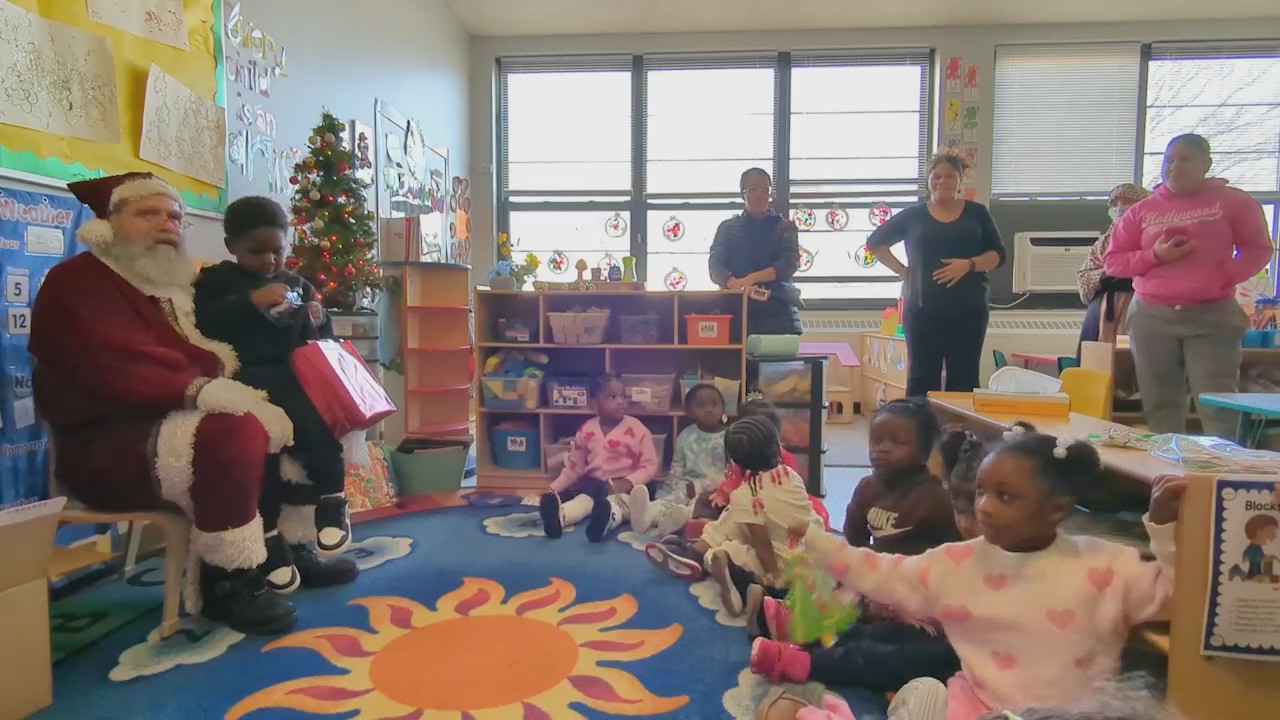Santa visits a Child's Place to promote reading