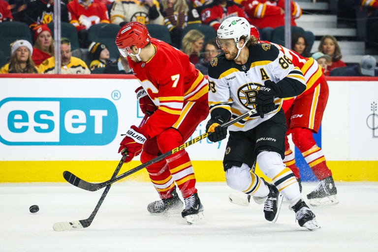 Bruins rally, douse Flames on David Pastrnak's OT winner Bruins rally, douse Flames on David Pastrnak's OT winner