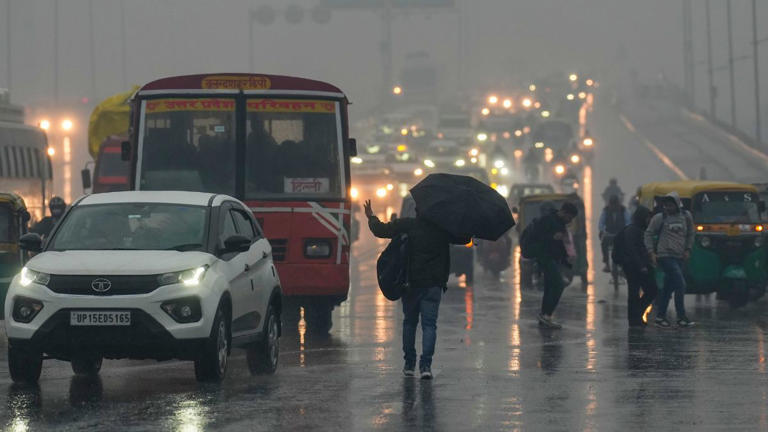Rain Continues In Delhi, IMD Issues Yellow Alert; AQI Improves To 'Moderate'