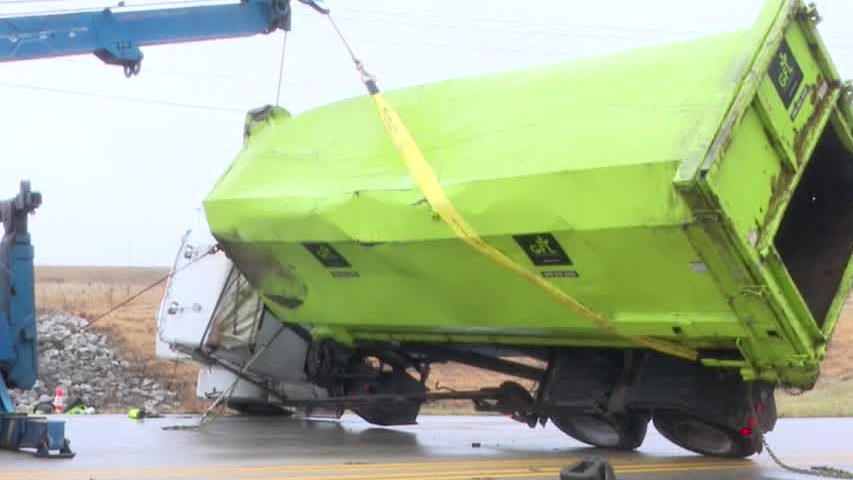 Garbage truck driver failed to lower lift, causing a crash in Tazewell