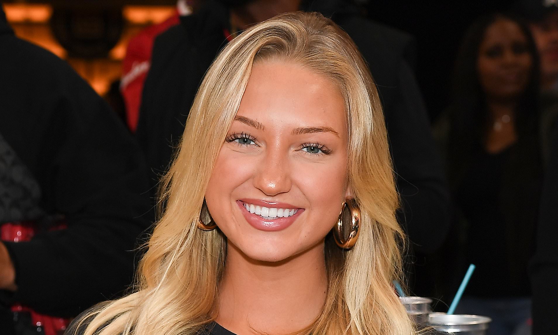 Sydney Thomas stuns in tight outfit at first NBA game as viral boxing ...