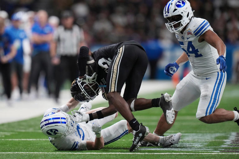 Shedeur Sanders, Travis Hunter held in check in Colorado’s blowout loss to BYU