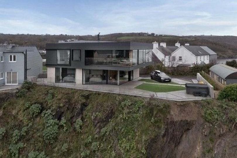 Inside incredible clifftop home that took nine years to build but was ...