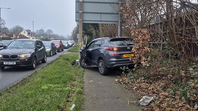 Moment driver crashes on A406 motorway while evading police pursuit