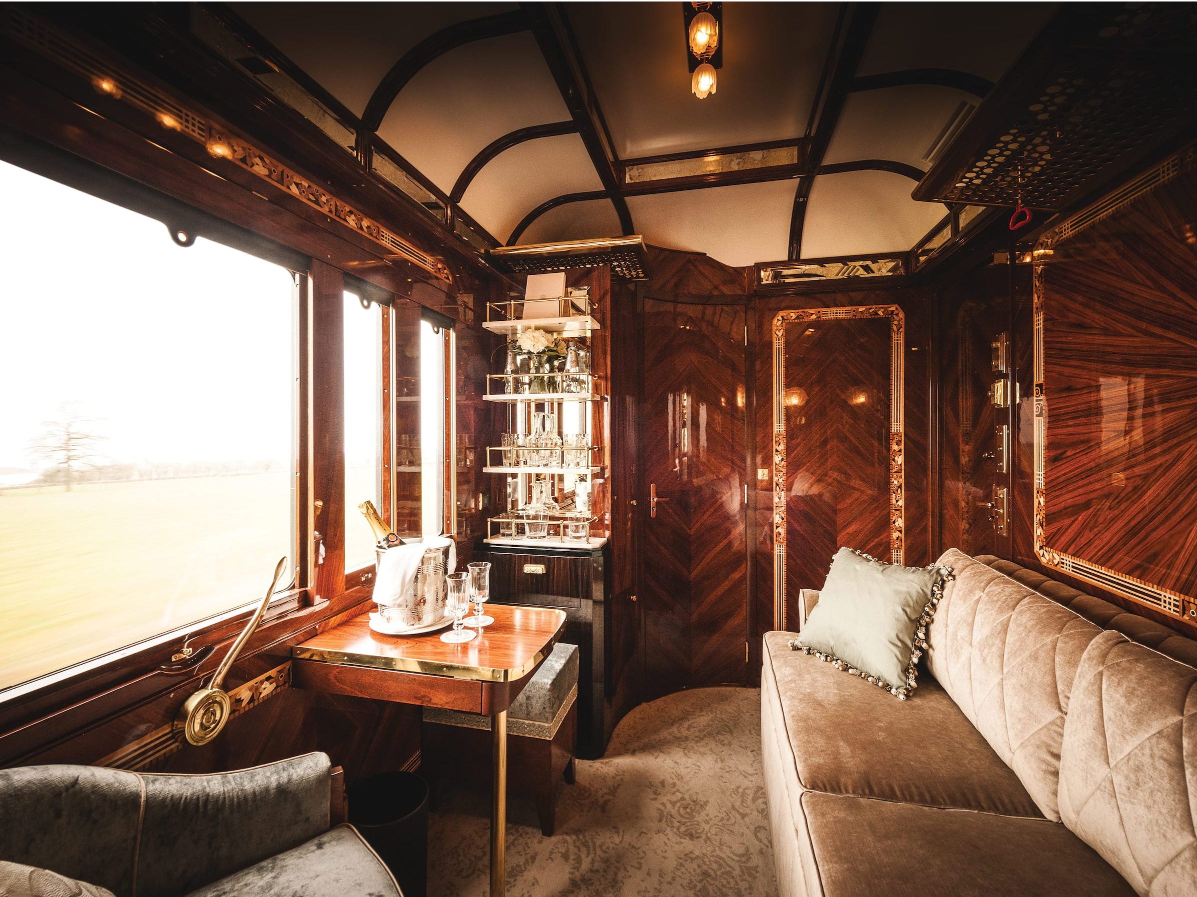 Inside first-class train travel around the world, from private suites ...