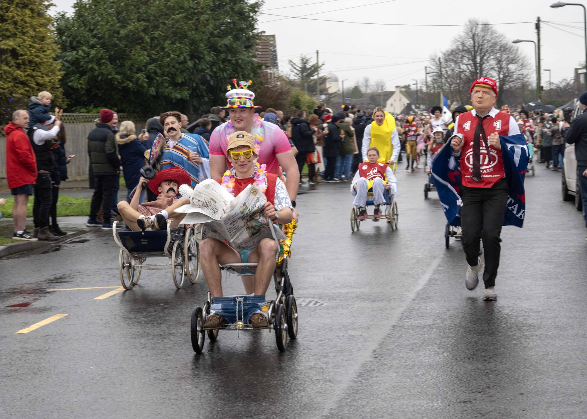 12 Photos: Festive boxing day fun as the 'Oldest Pram Race in the World ...