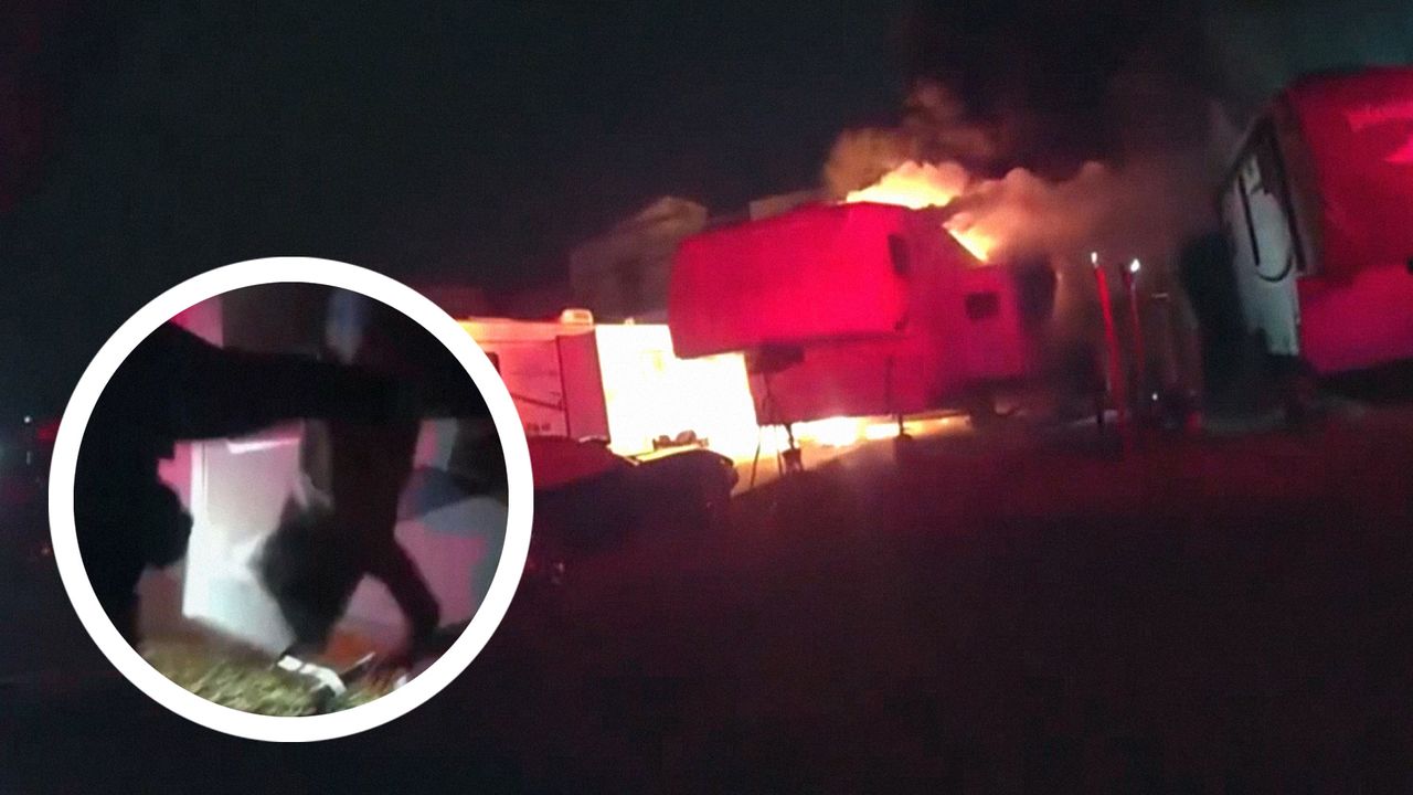 Bodycam: Police rescue man from inside burning trailer in California