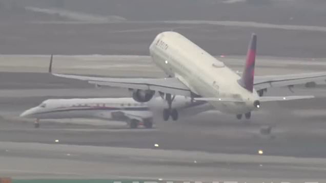 Terrifying moment plane nearly crashes into jet carrying basketball ...