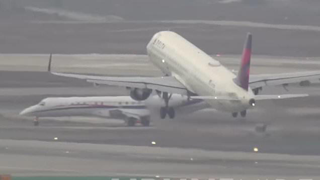 Terrifying moment plane nearly crashes into jet carrying basketball ...