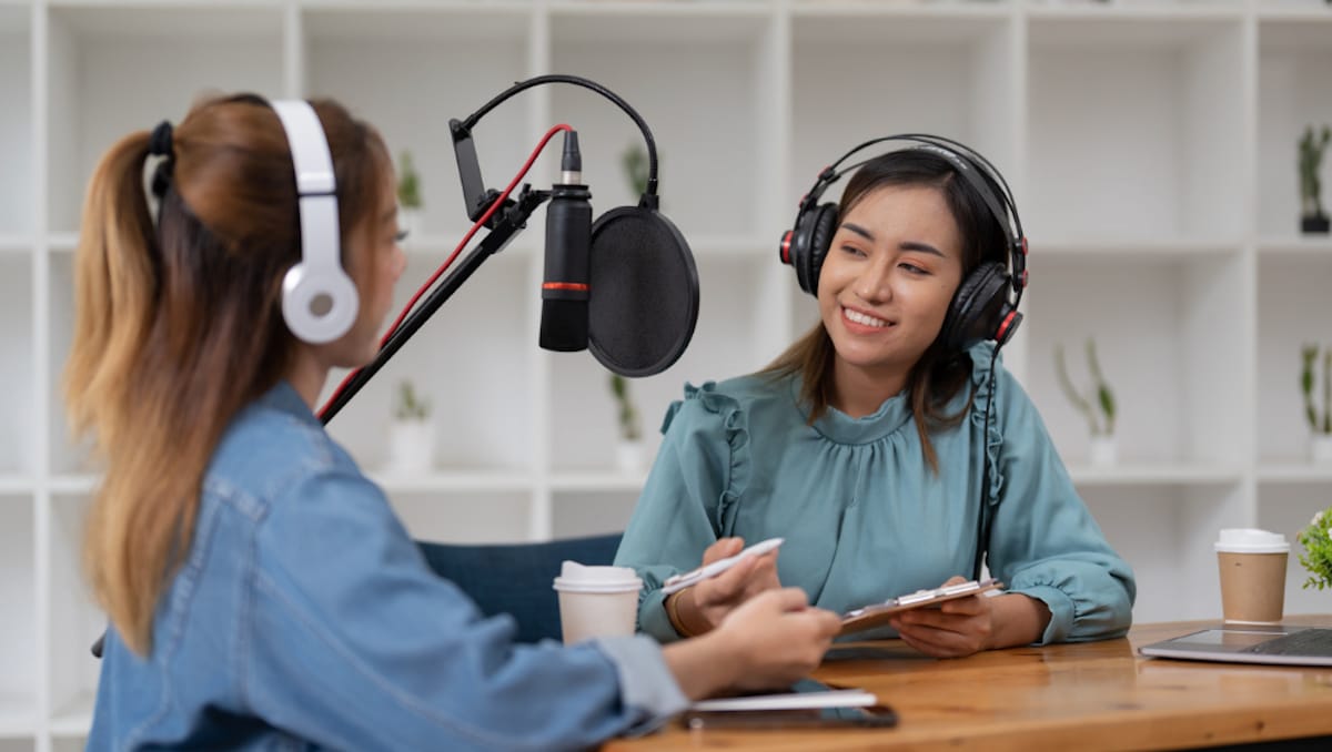 12 of the Best Podcasts to Get—and Keep—Your 2025 Rolling