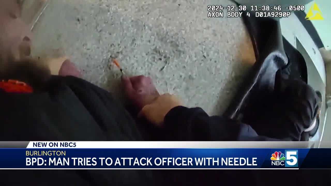 Body cam footage shows man trying to attack officer with needle