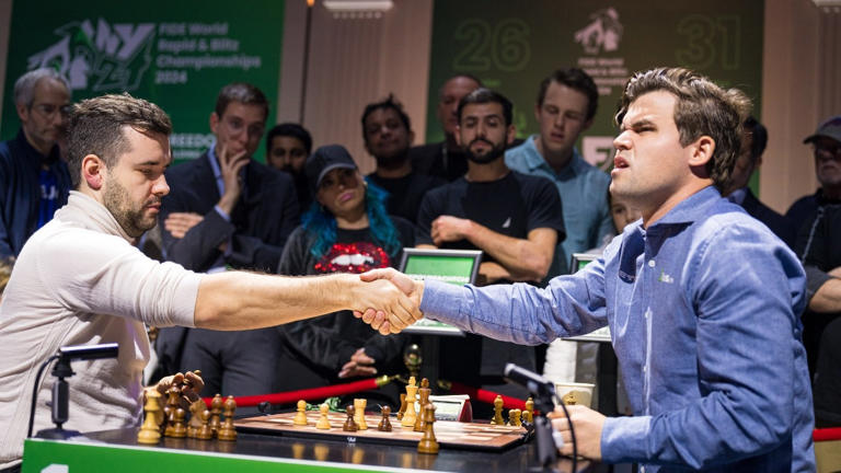 Historic tie: Magnus Carlsen, Ian Nepomniachtchi share World Blitz ... Historic tie: Magnus Carlsen, Ian Nepomniachtchi share World Blitz ...