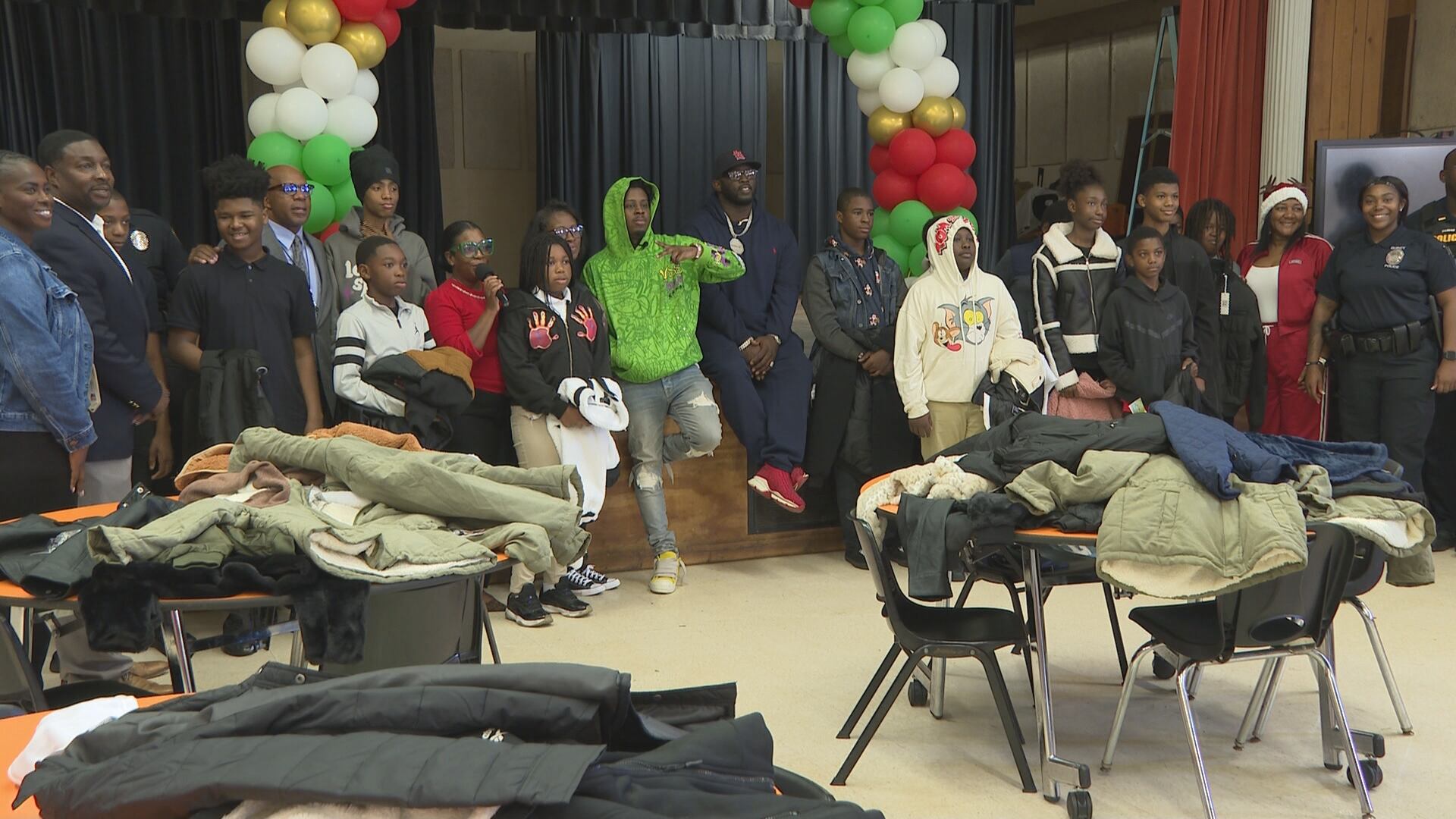 Rapper Real Boston Richey donates over 100 coats to Quincy middle ...
