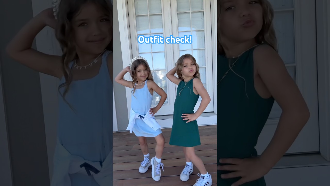 Twins check their outfits, style on point