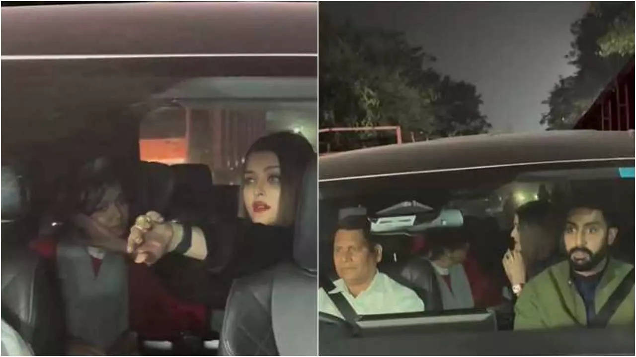 Aishwarya Rai Bachchan shields daughter Aaradhya from flashlights while ... Aishwarya Rai Bachchan shields daughter Aaradhya from flashlights while ...