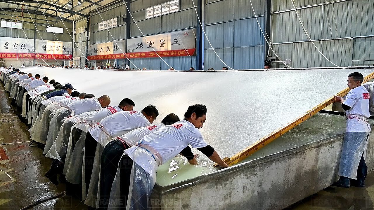 Making giant sheets of paper by hand: Inside the factory
