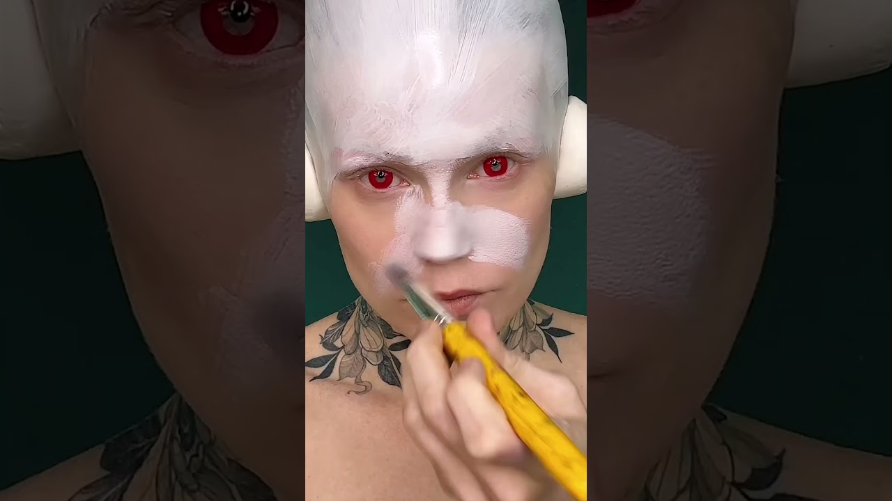 Realistic Frieza cosplay captured through detailed makeup