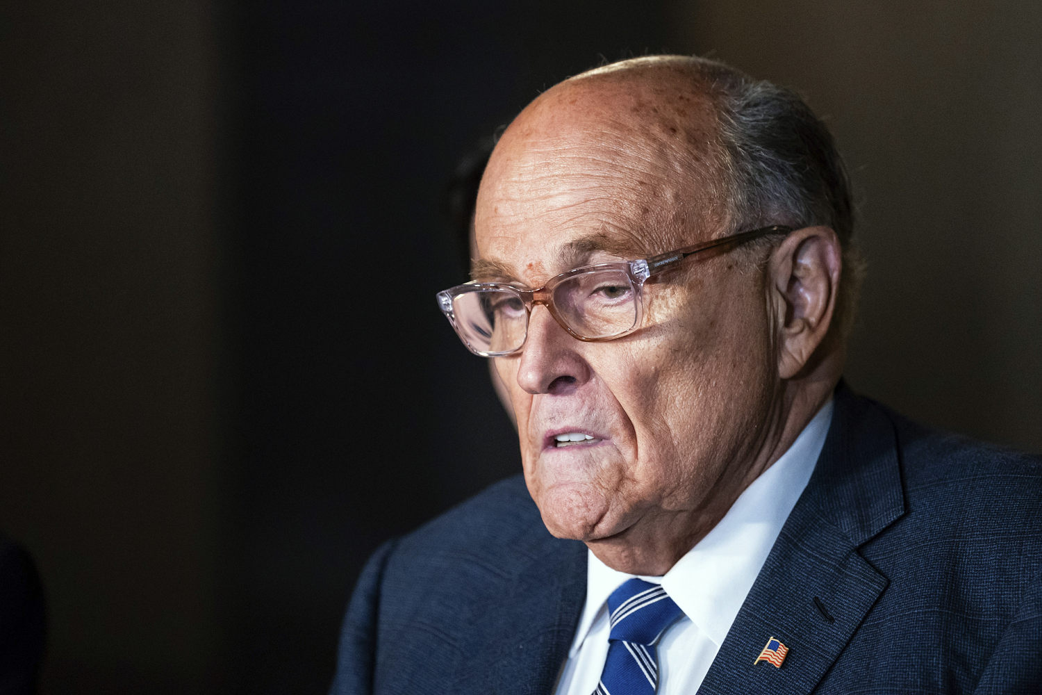 Judge finds Rudy Giuliani in contempt of court in defamation case