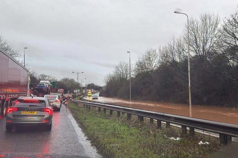 Car rescued from flooded A52 after heavy rain leads to road closure