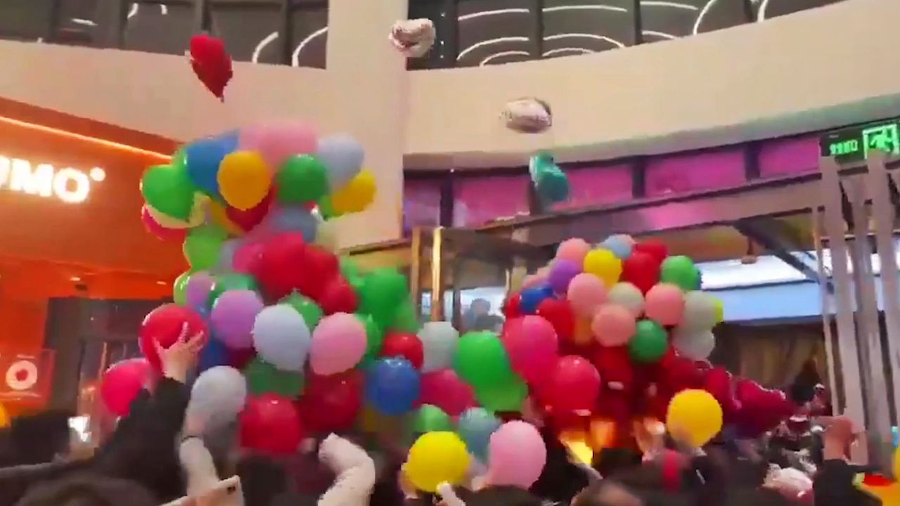 Chaos erupts as mall shoppers engulfed by fireball after balloons explode