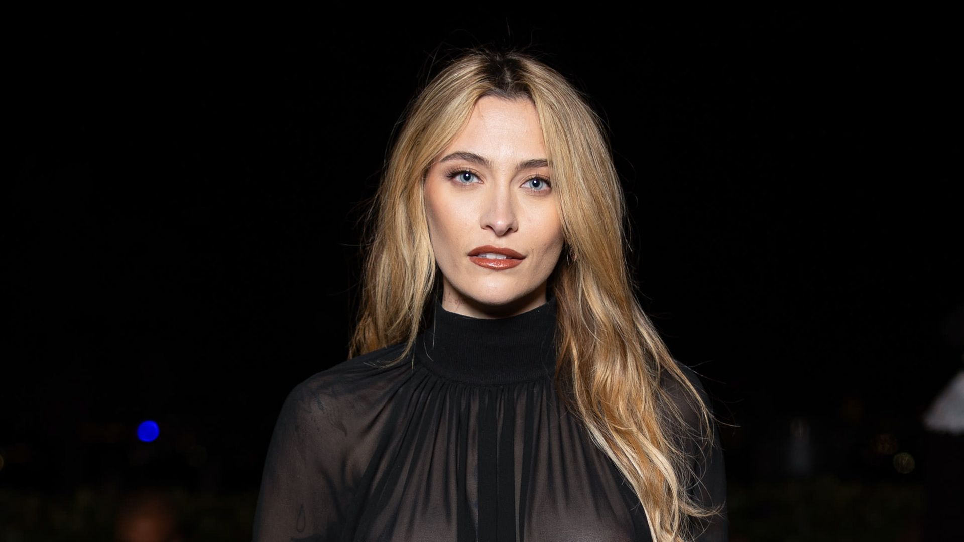 Paris Jackson wows with glitzy gown and bombshell hair on red carpet