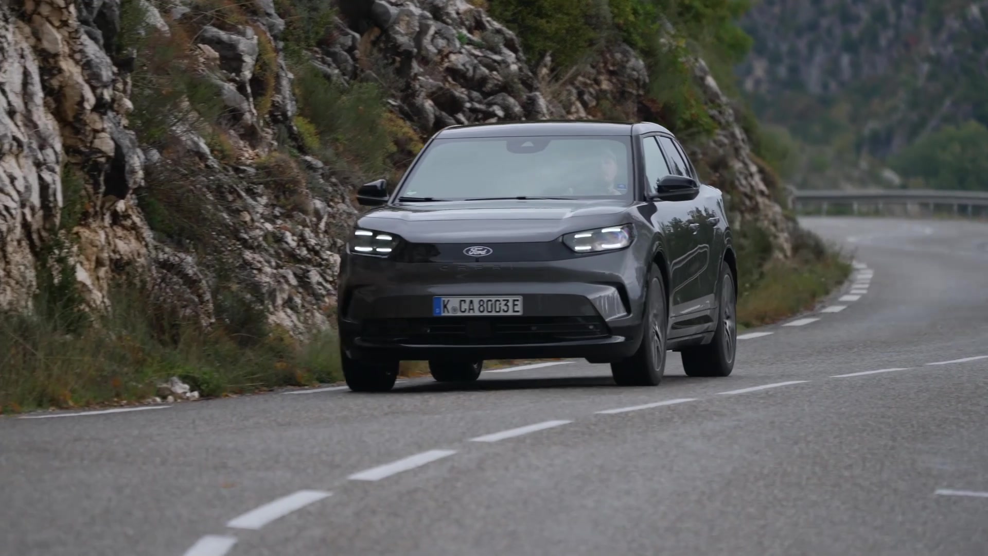 The new Ford all-electric Capri in Magnetic Silver Dynamic Driving Video