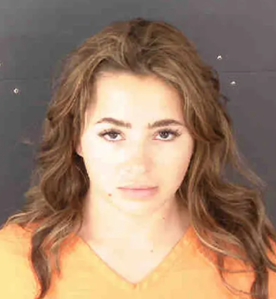 Hooters waitress flirts shamelessly with cop who pulled her over for ...