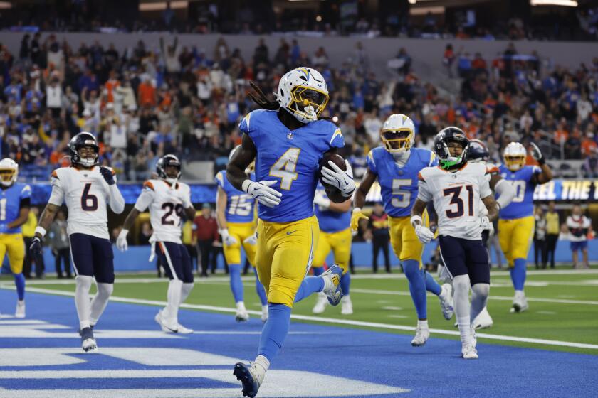 Chargers fortify rushing attack with return of Gus Edwards, addition of ...