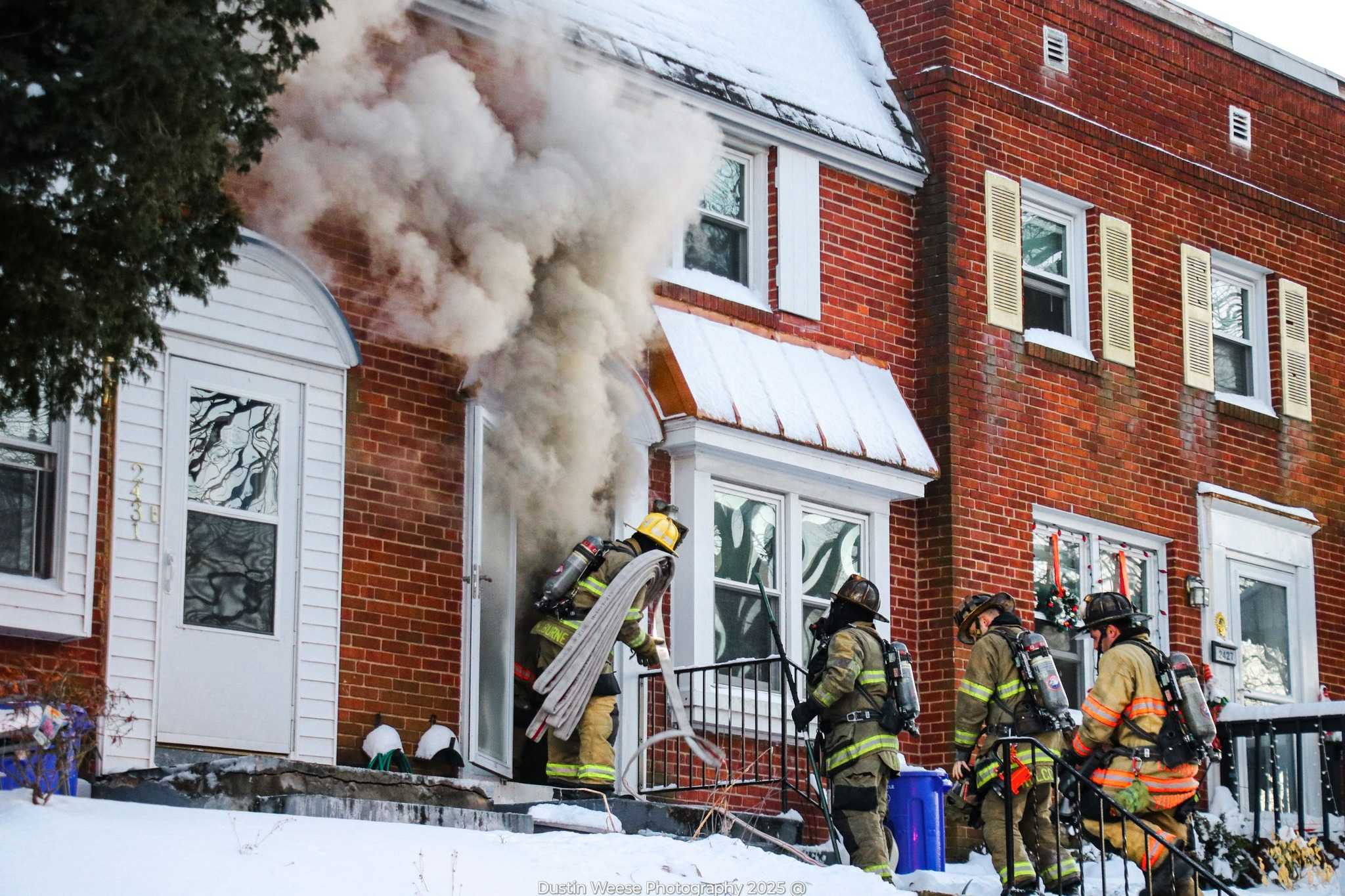 Smoke pours out of home as basement burns