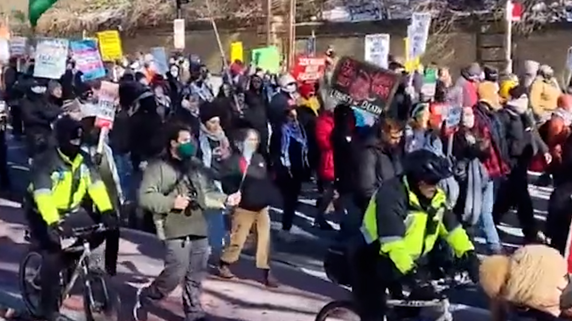 Protesters march through the streets of DC on Inauguration Day to ...