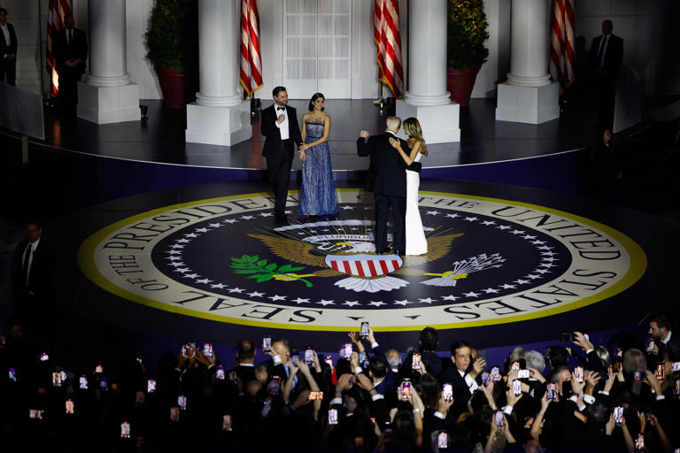 Trump celebrates with supporters at the inaugural balls