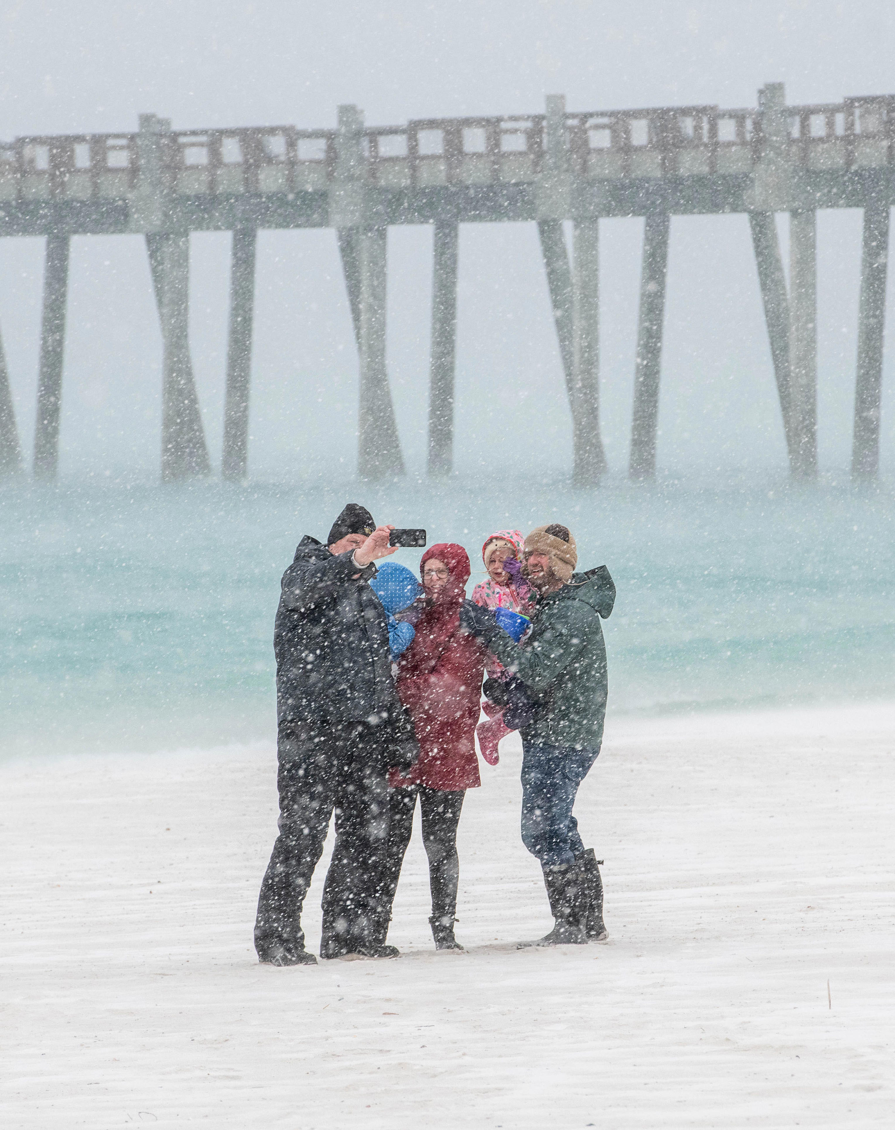 Rare winter storm in Florida: See snow photos from Pensacola ...