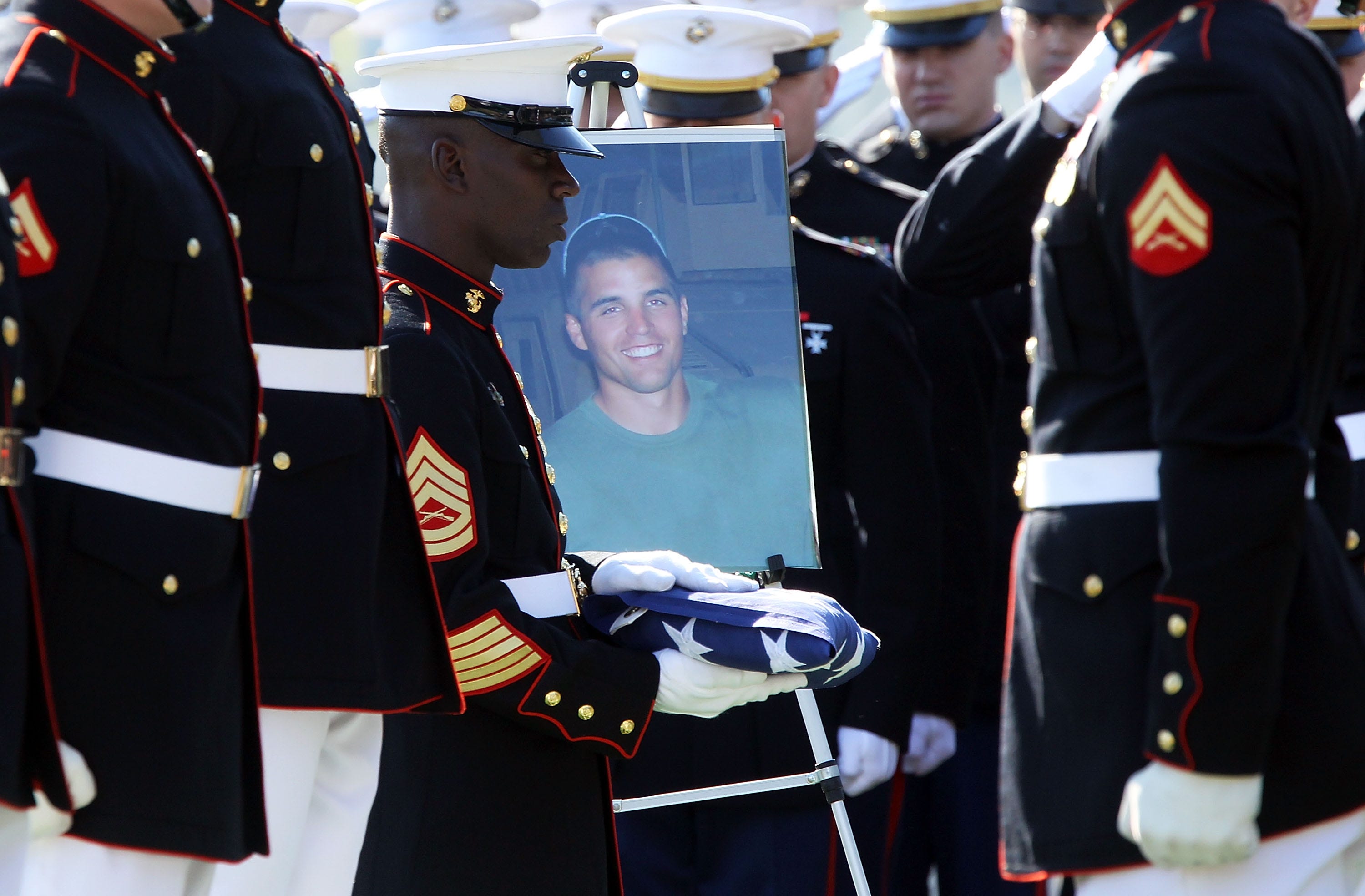 US Navy's new amphibious warship honors post-9/11 Marine killed in Iraq ...