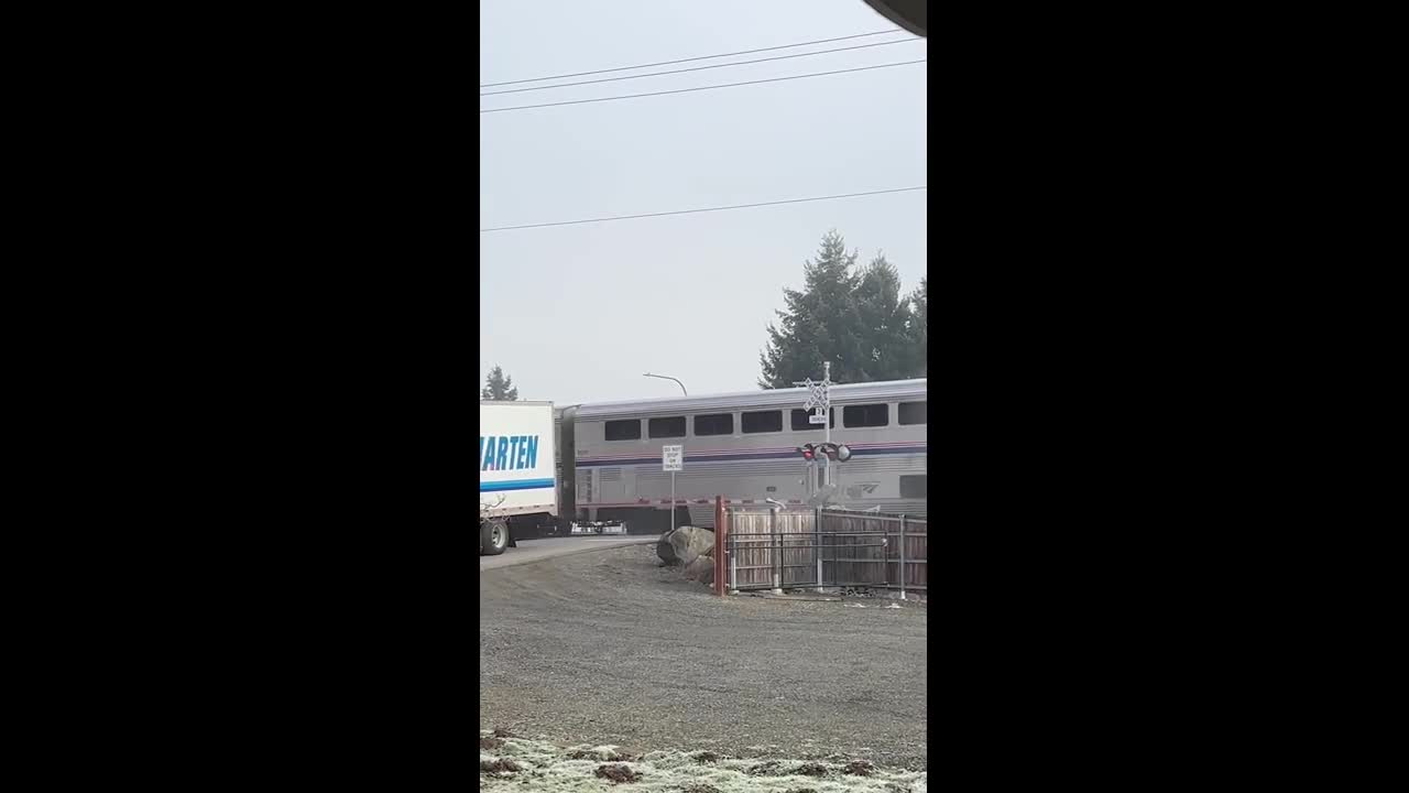 Shocking video shows Amtrak train smashing through a stalled semi-truck