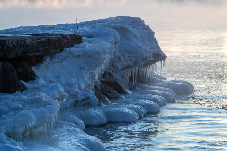 How much ice is covering the Great Lakes? Altogether, one third