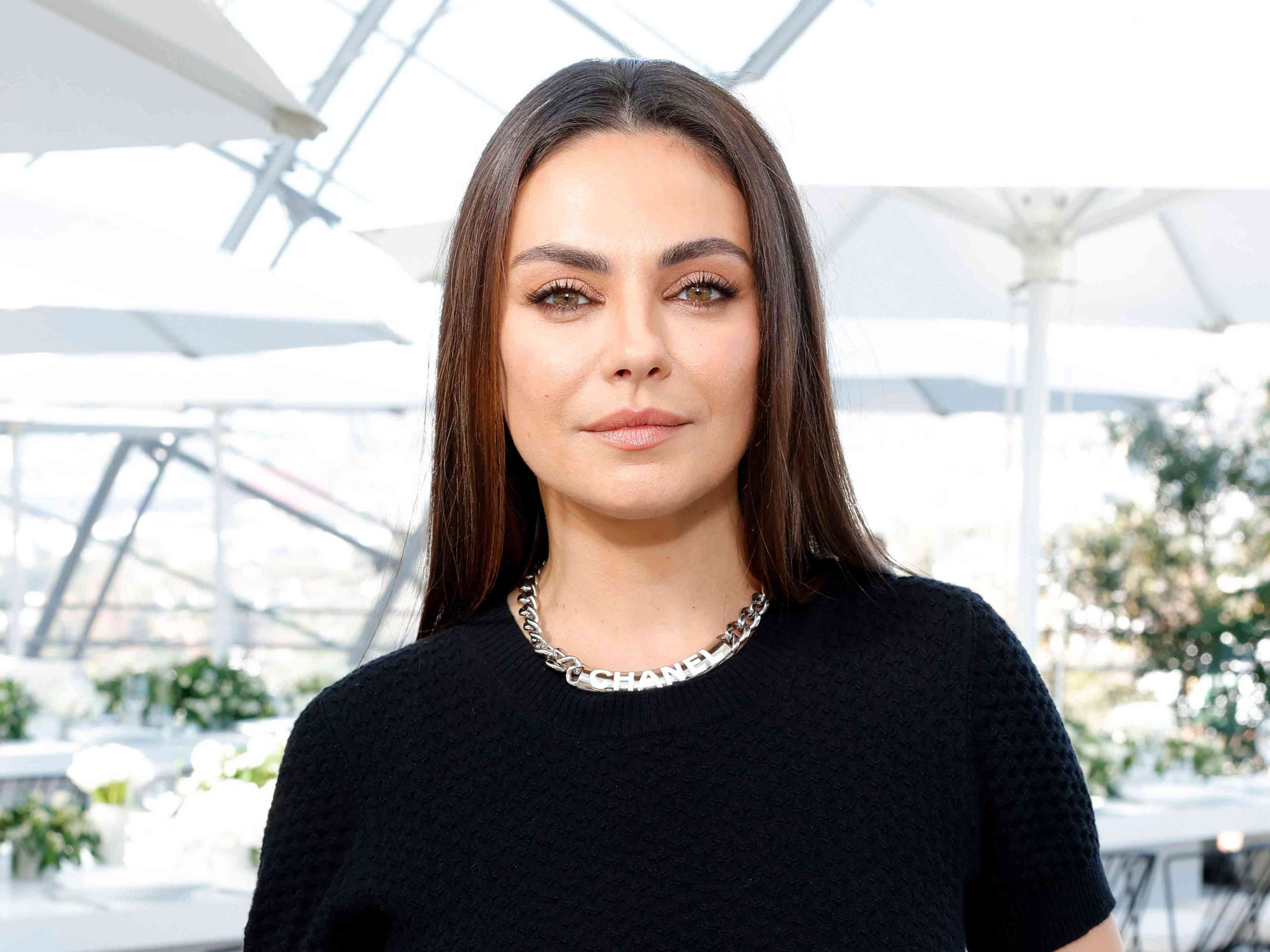 Mila Kunis Swapped Her Signature Dark Hair for a Cherry-Cola Red Shade Mila Kunis Swapped Her Signature Dark Hair for a Cherry-Cola Red Shade