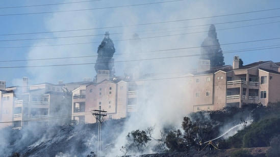 Friars fire near San Diego mall forces evacuations as California's ...
