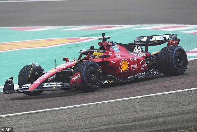 Lewis Hamilton pictured driving a Ferrari Formula One car for the first ...