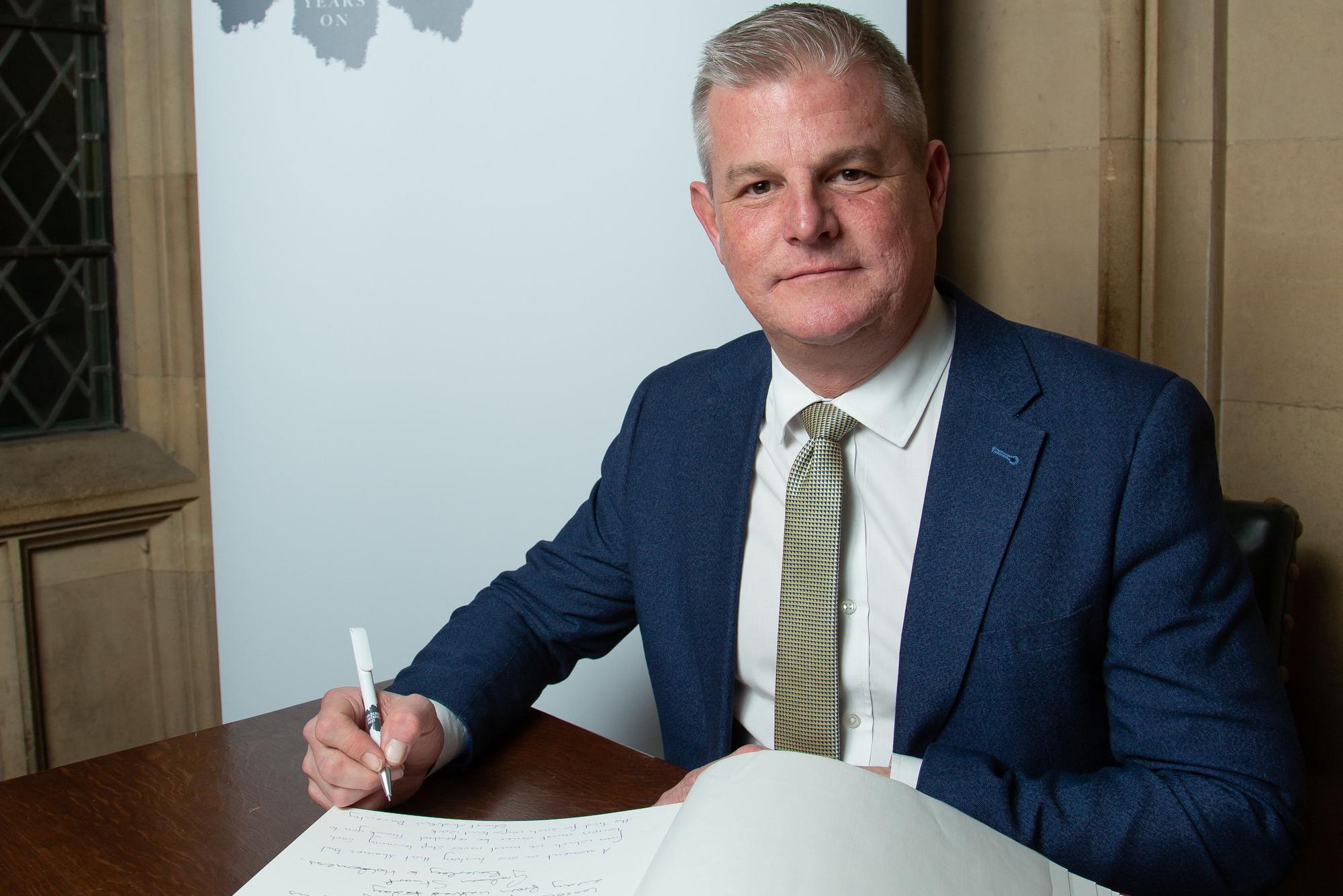 Stuart Andrew MP signs Holocaust Educational Trust Book of Commitment