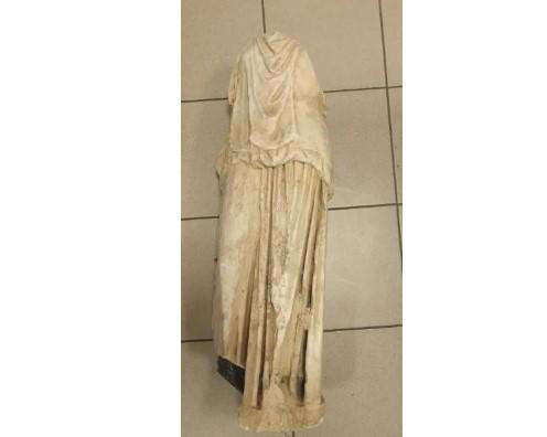 2,000-year-old statue found dumped near garbage cans