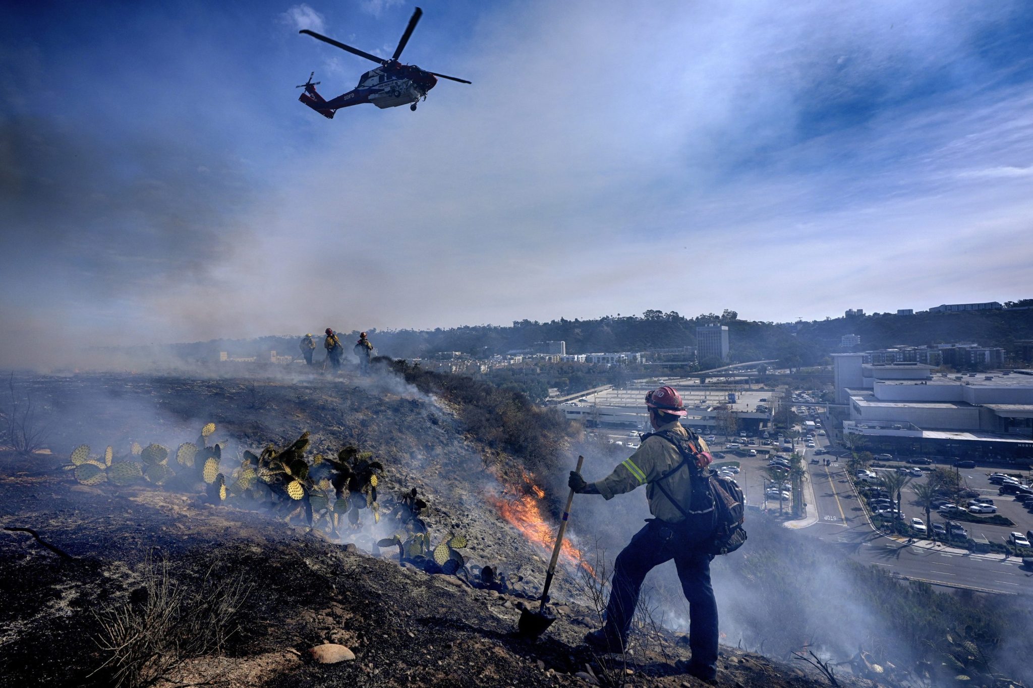 California faces more fire risk and strong winds but potential rain ...