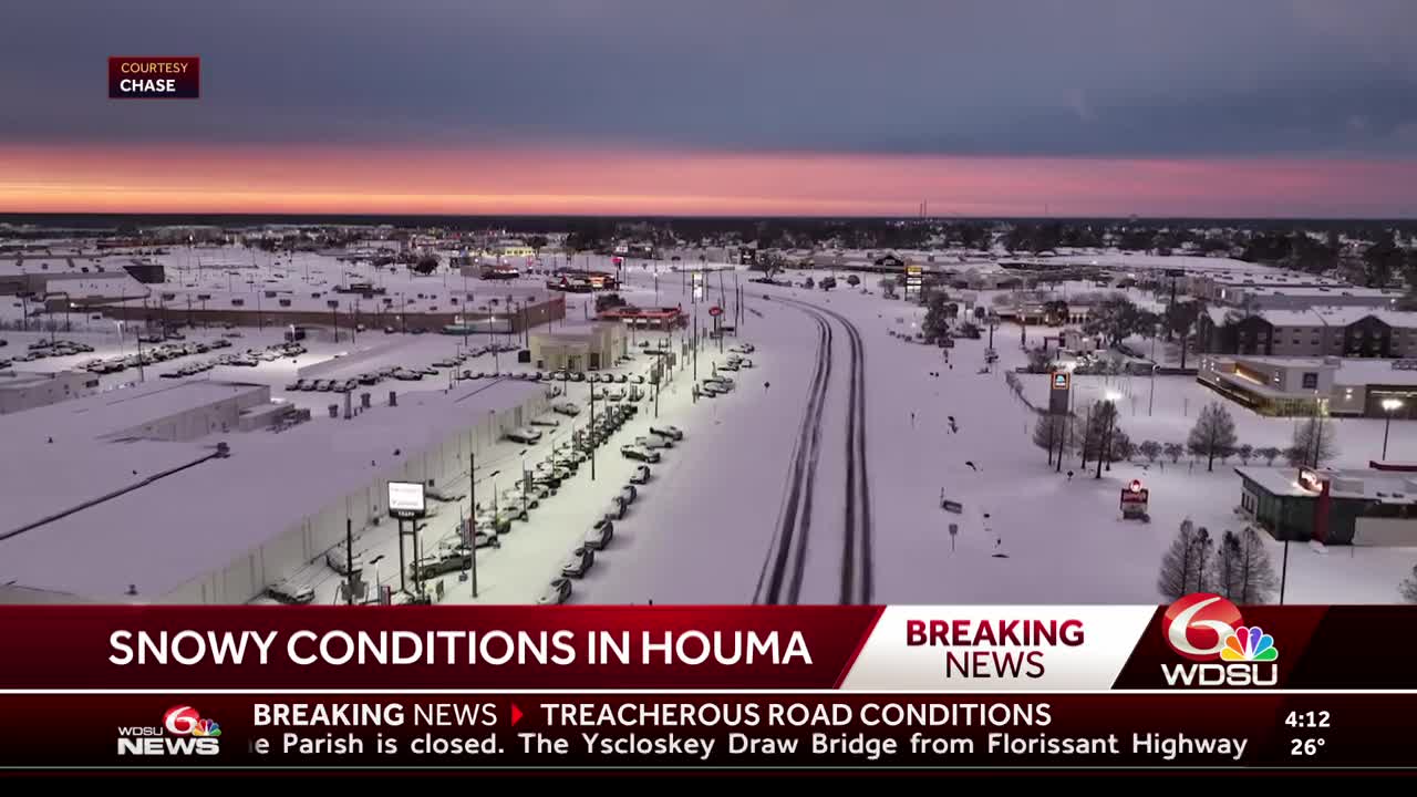 Drone footage shows snow over Houma