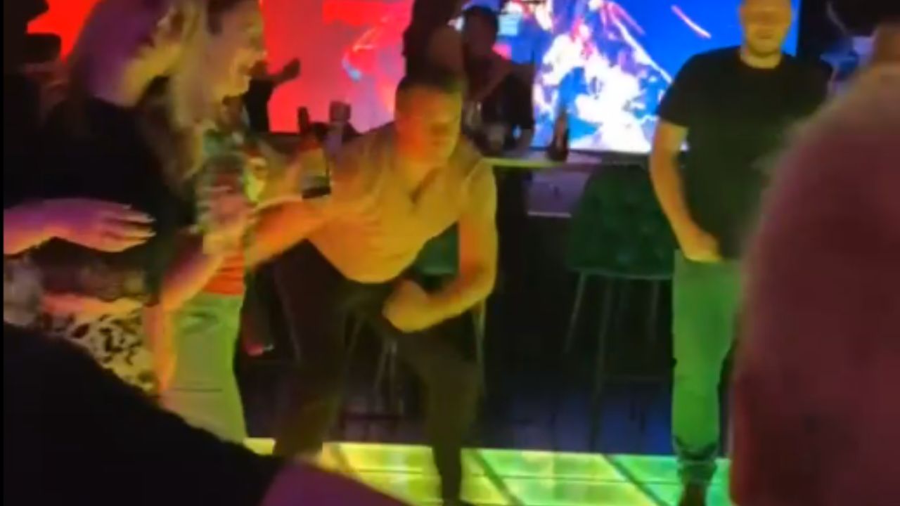 Carefree dancer rocks the floor before taking an embarrassing fall