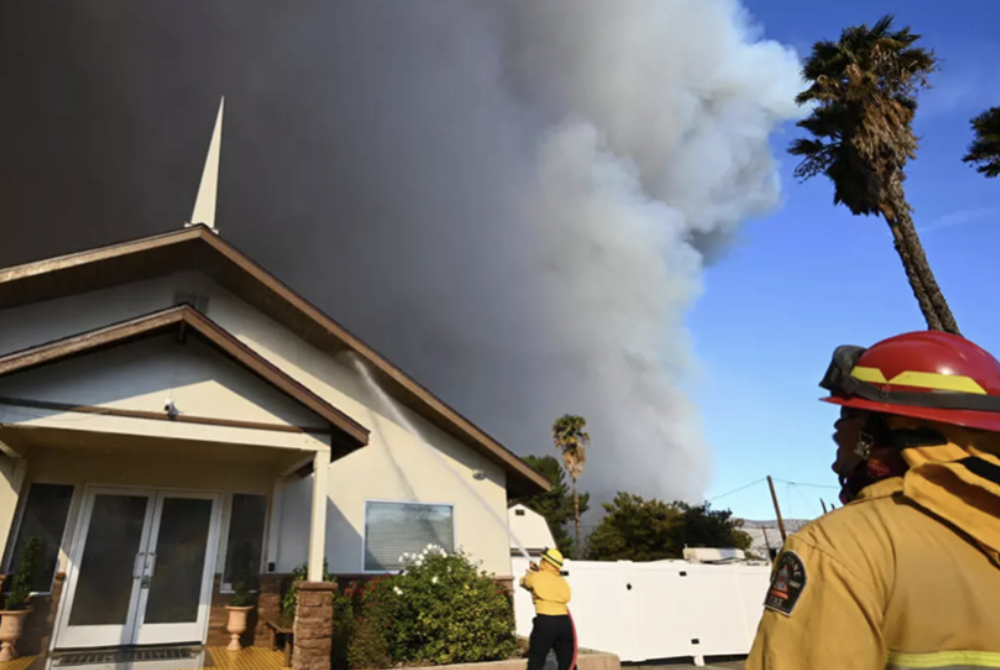 Mass evacuations after explosive new fire erupts near Los Angeles