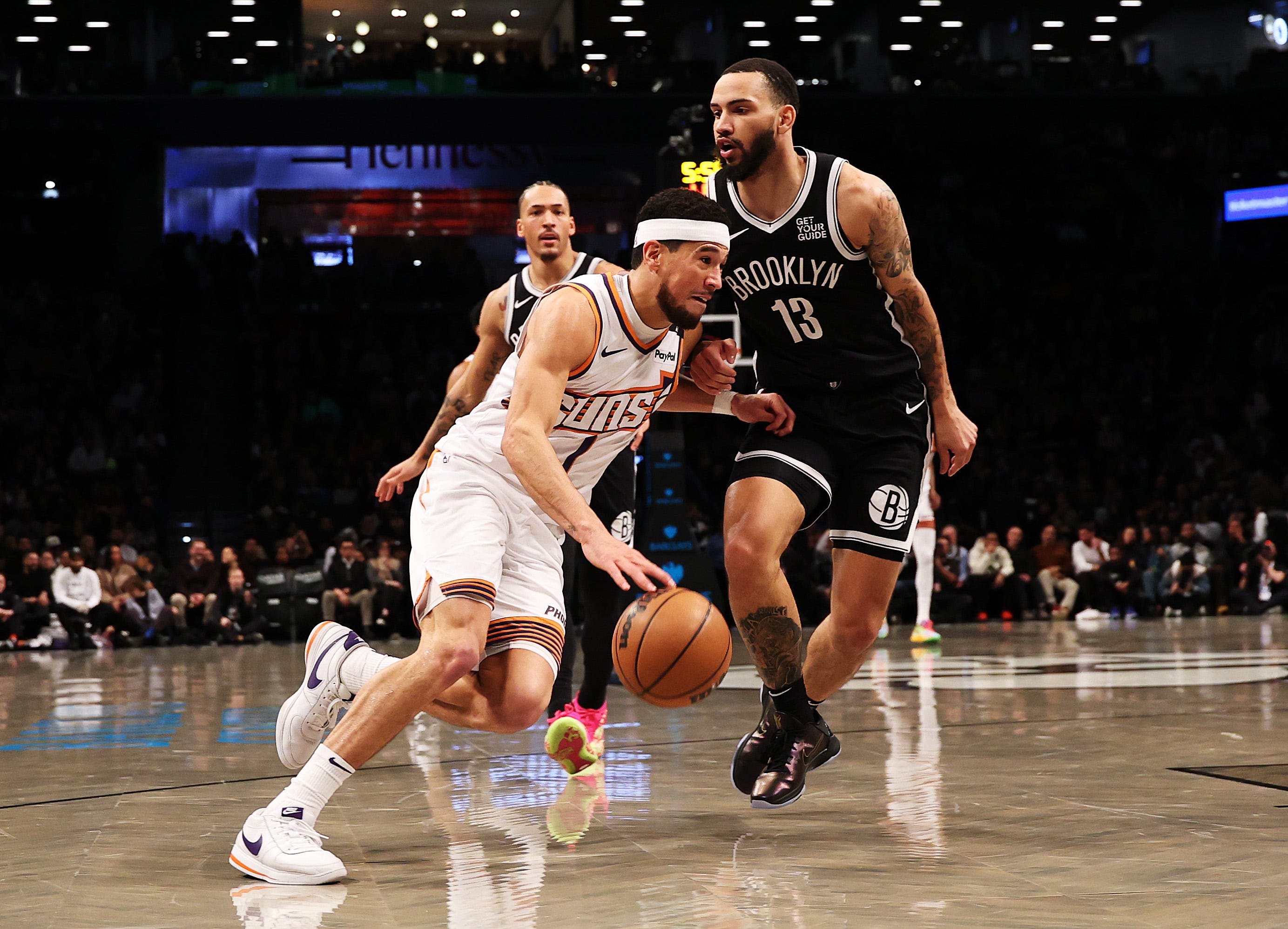 Suns' Devin Booker channels Forrest Gump in Nike ad, has a shoe ...