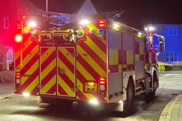 Nine fire crews tackle field fire overnight as flames seen for miles