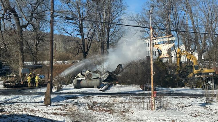 Flames destroy building near Benton