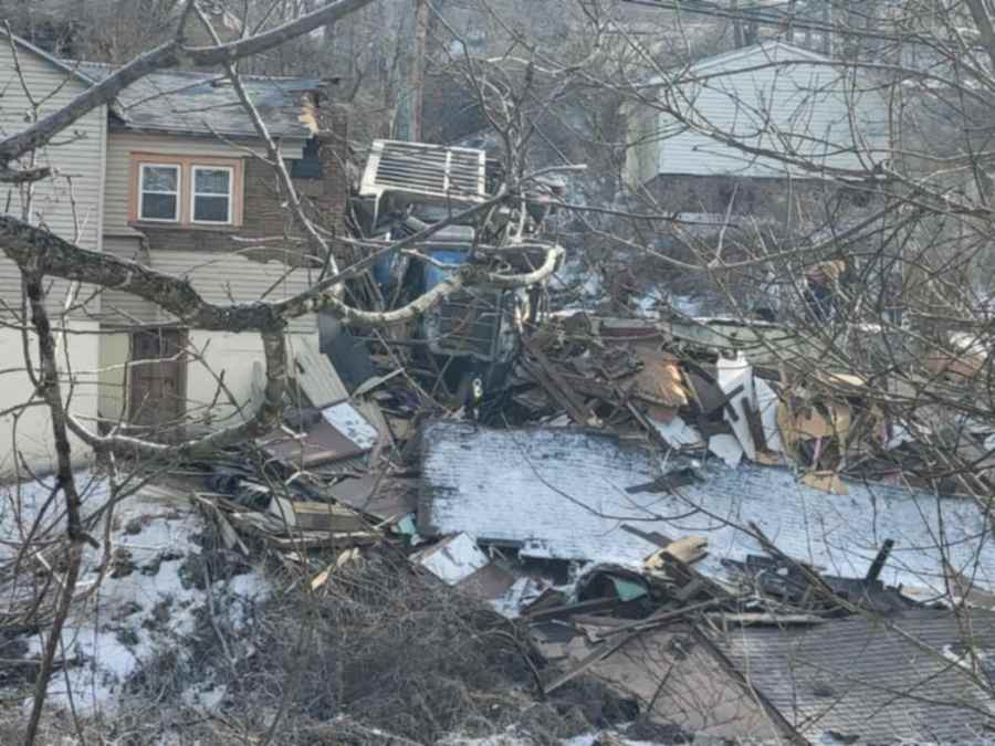 Coal truck rolls over into home in Mercer County